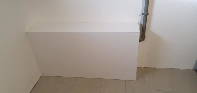 Fabrication et pose d’un cache-tuyaux | Menuiserie Huber Haguenau